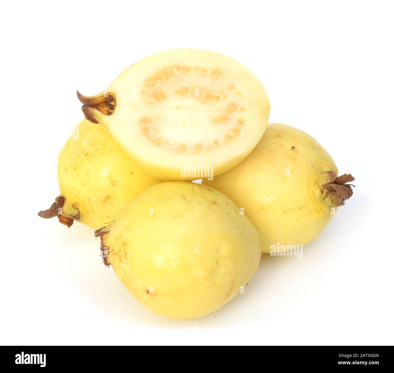 Chopped and whole Guava fruit on white background Stock Photo - Alamy