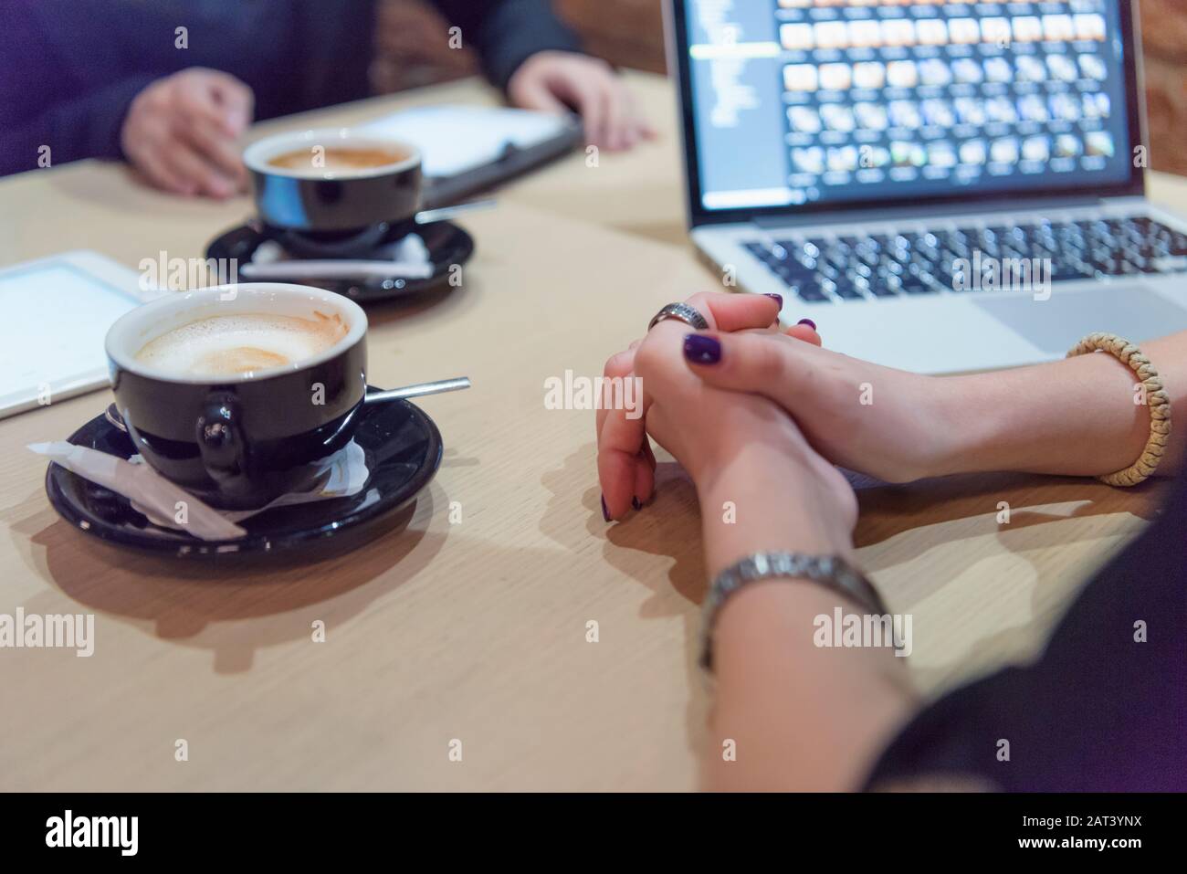 Full concentration at work. Group of young business people working and ...