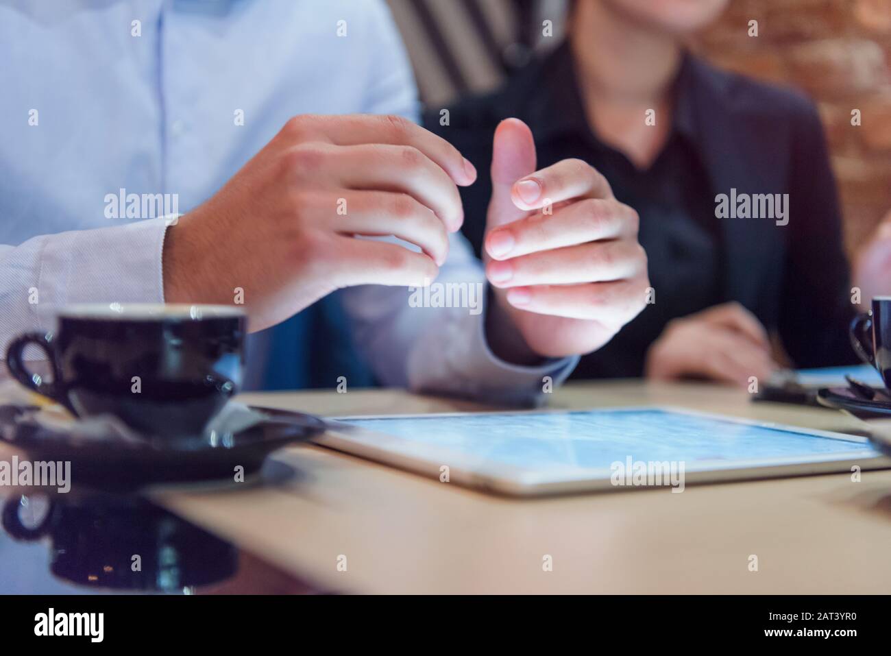 Full concentration at work. Group of young business people working and ...