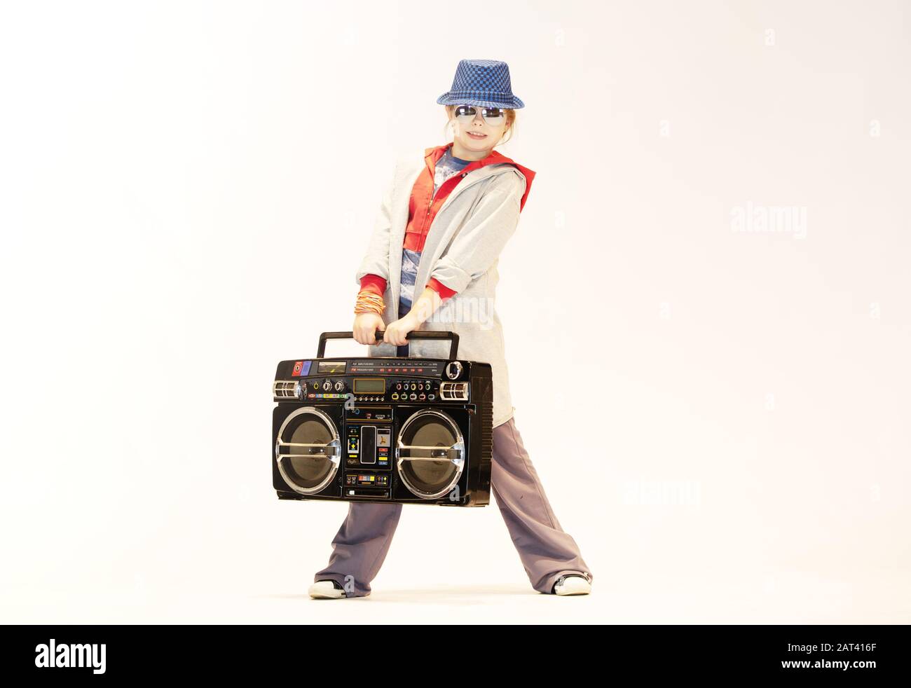 little girl with a big boobox, unique kid, hip hop style Stock Photo ...