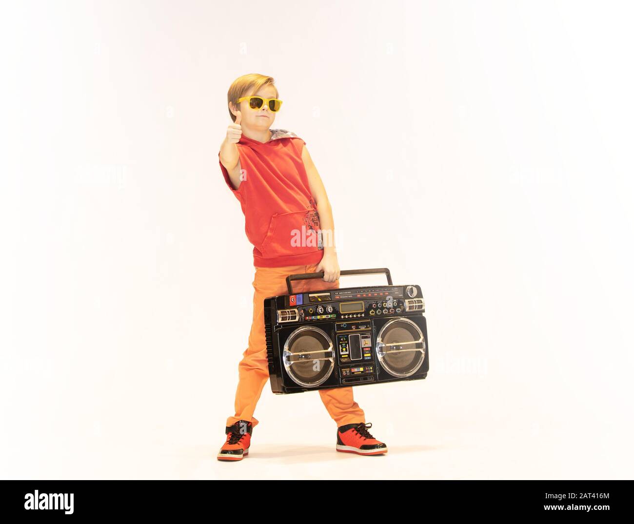 little boy with a big boombox, unique kid, hip hop style Stock Photo ...