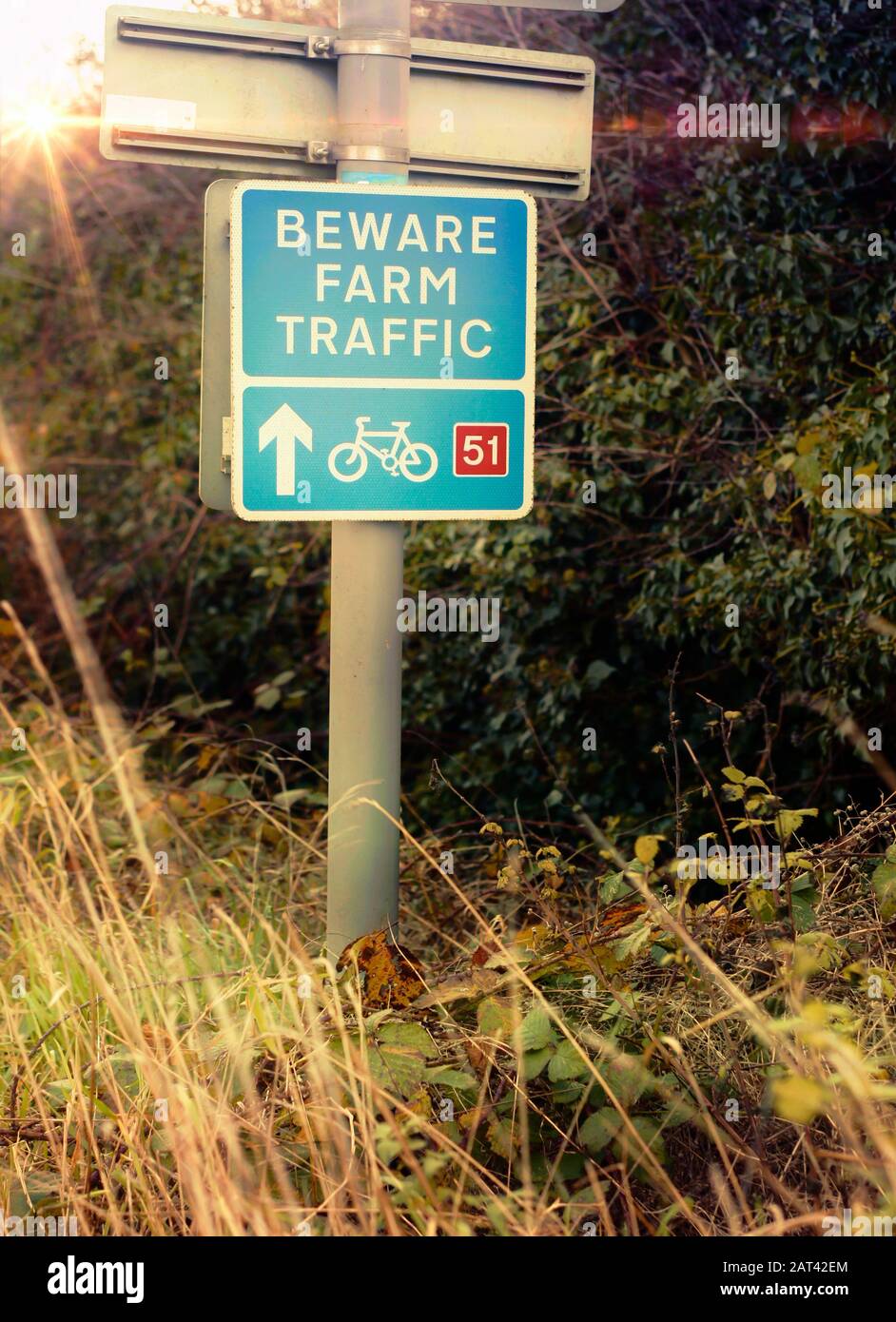 A warning sign for farm traffic on a rural road in the UK Stock Photo ...