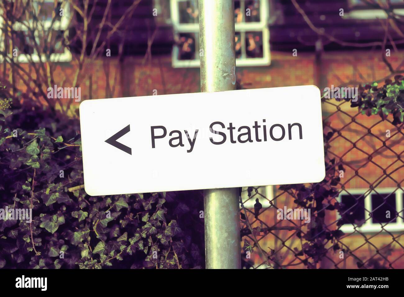 A sign for a pay station at a carpark in the UK Stock Photo - Alamy