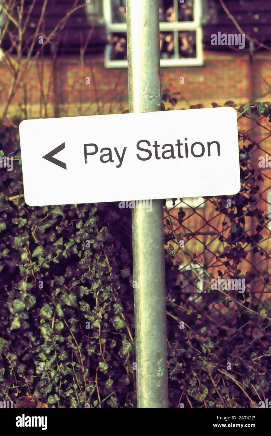 A sign for a pay station at a carpark in the UK Stock Photo - Alamy