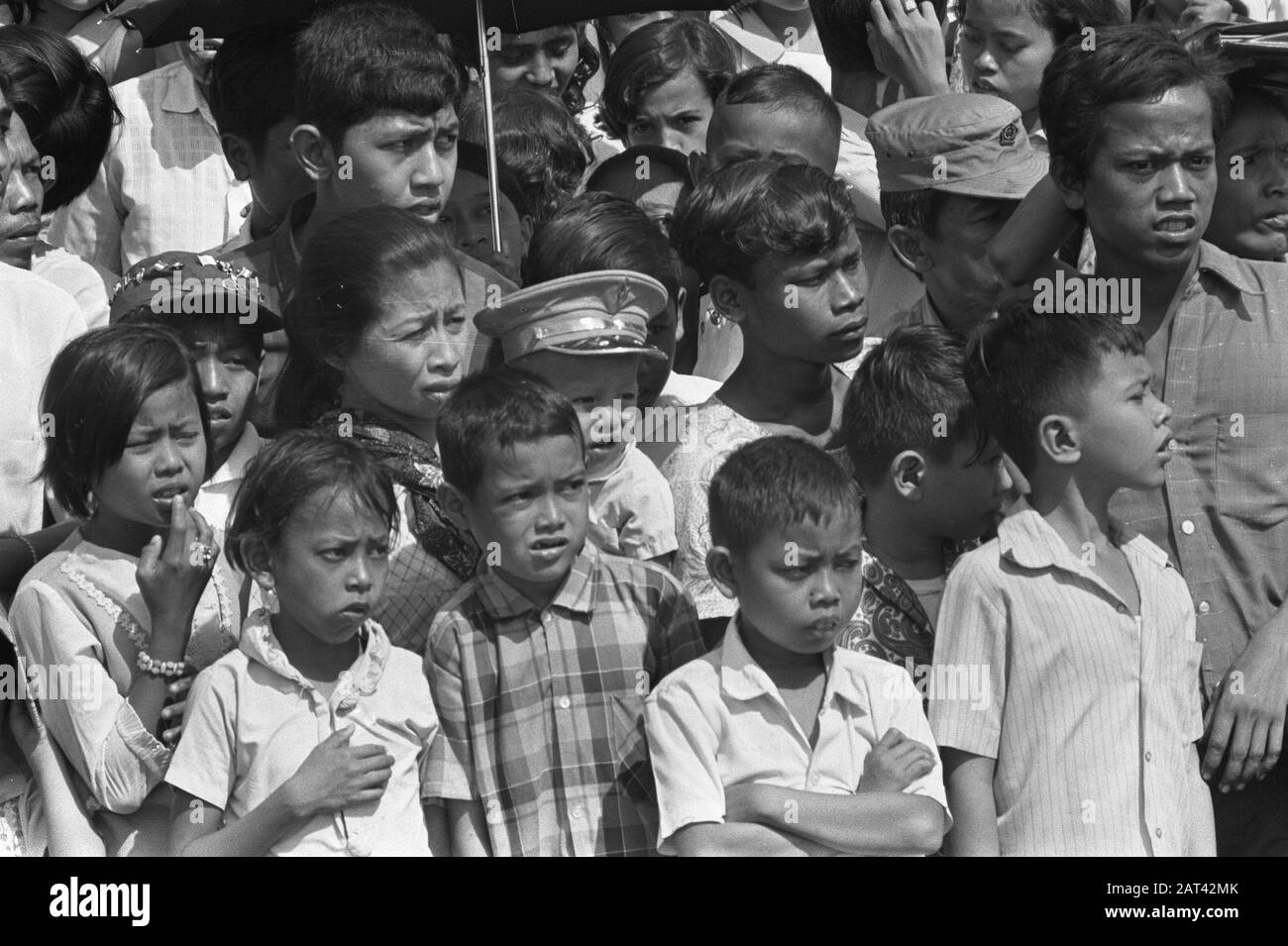 Indonesia, Jakarta, children watching parade in order to celebrate ...
