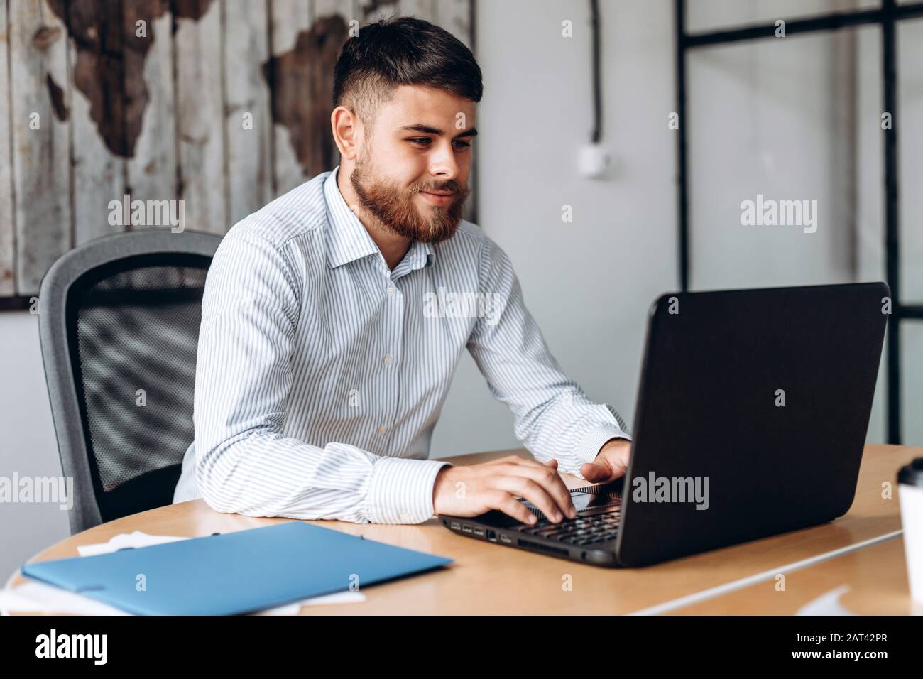 Bearded man working documents hi-res stock photography and images - Alamy