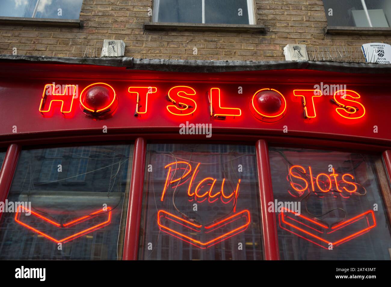Neon signs indicating an amusement arcade in Soho, London England UK GB ...