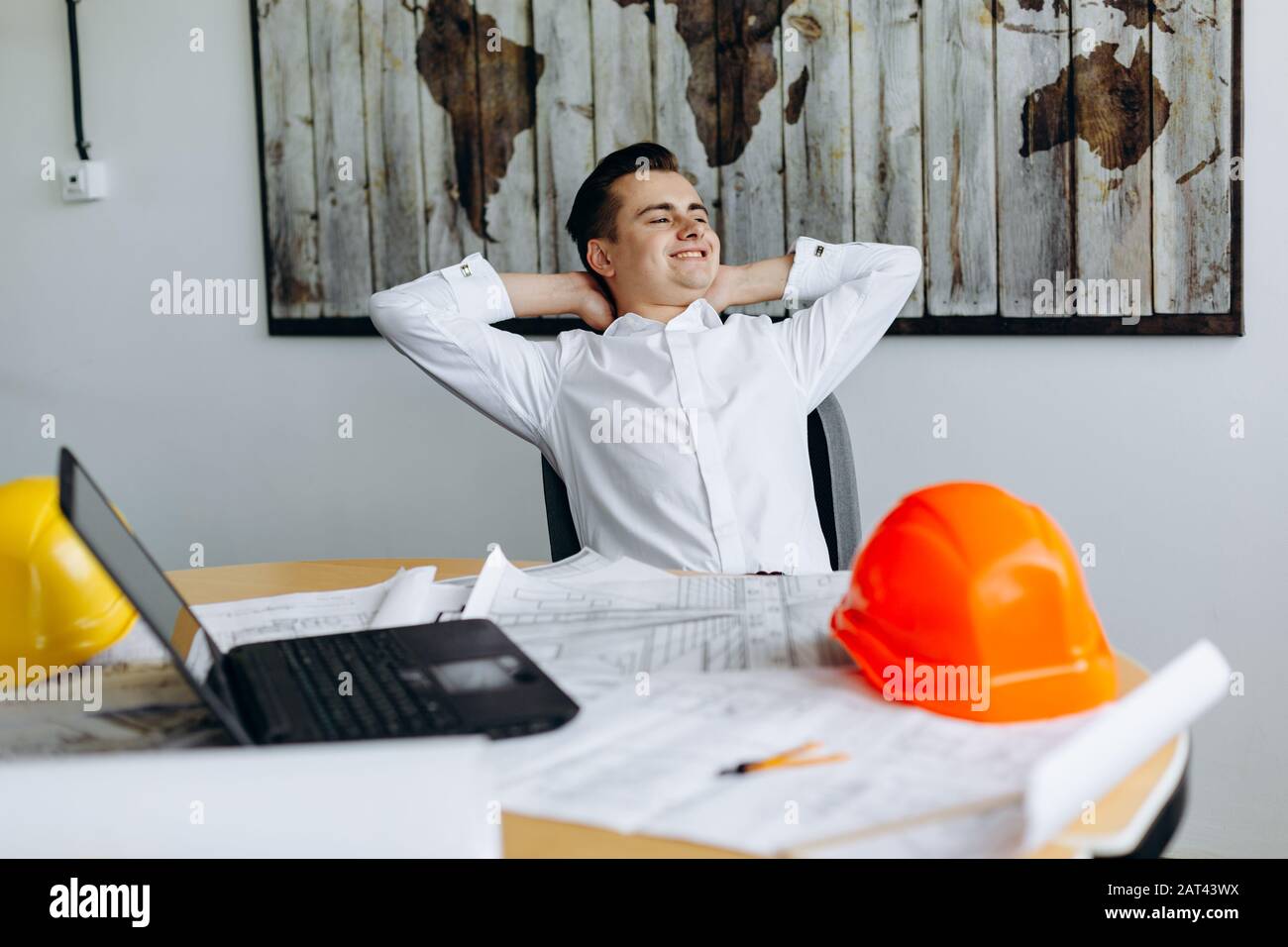 Businessman desk office leaning back hi-res stock photography and ...