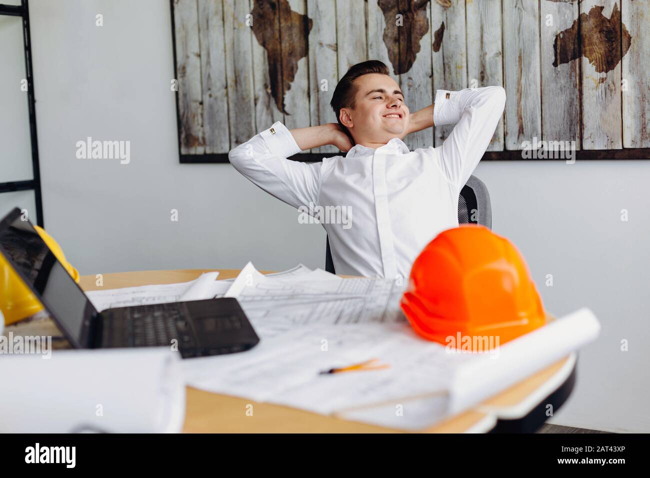 Businessman desk office leaning back hi-res stock photography and ...