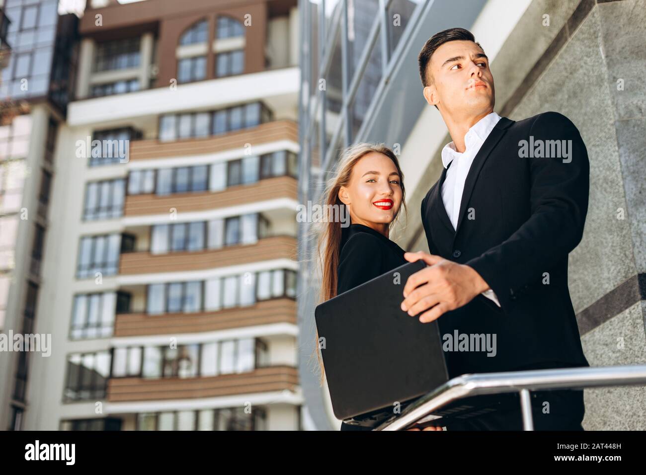 Business partners talking outdoor hi-res stock photography and images ...