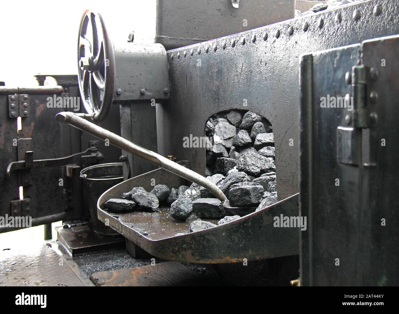A Shovel and Coal on a Vintage Railway Steam Engine Stock Photo - Alamy