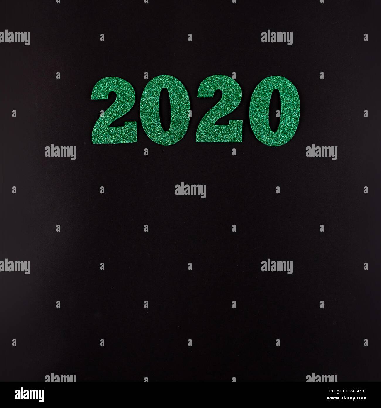 New Year 2020, green numbers on black background Stock Photo - Alamy