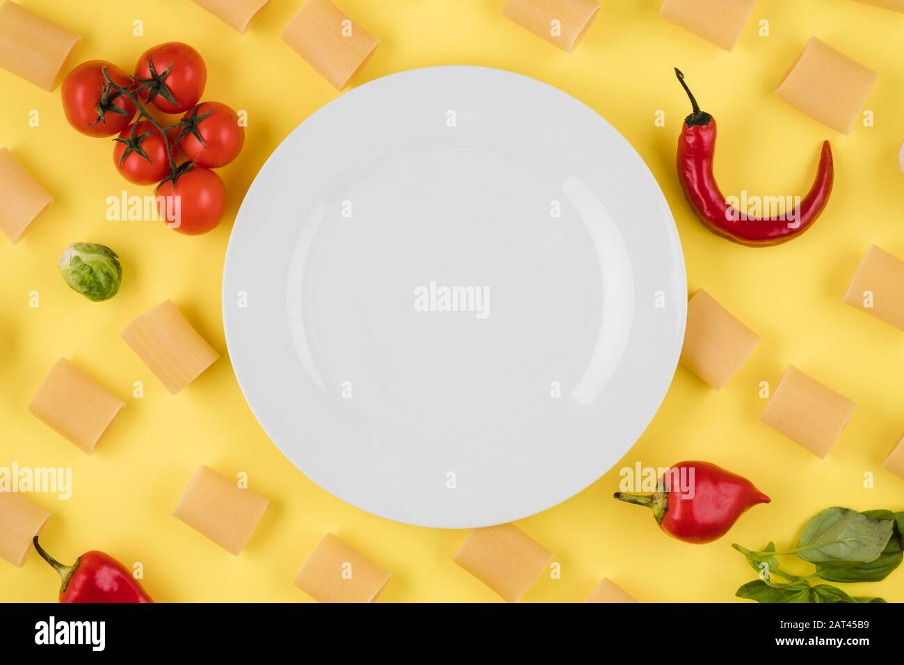 Italian food cooking ingredients and empty plate pasta hi-res stock ...
