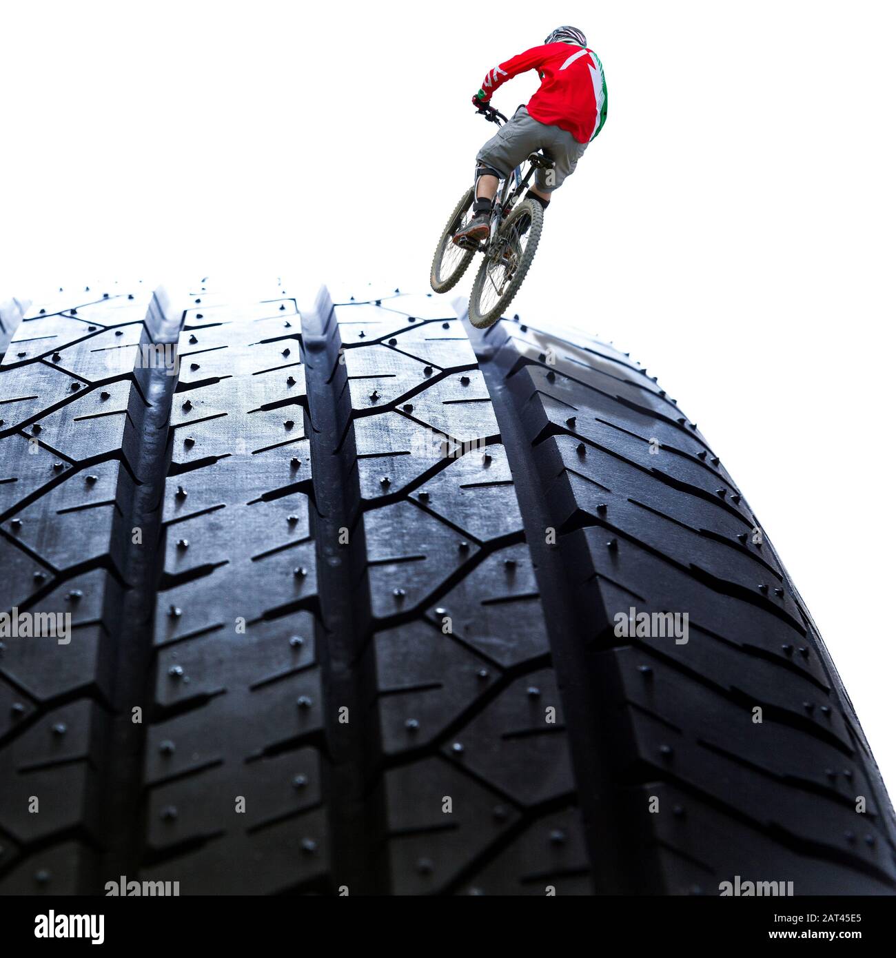 biker on the tire - concept Stock Photo - Alamy