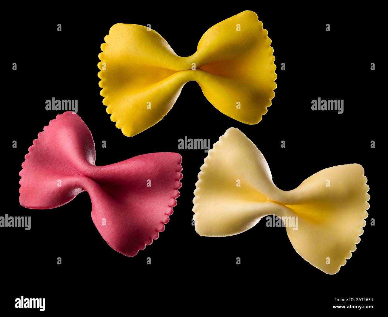 Set of colourful farfalle pasta isolated on black background Stock ...