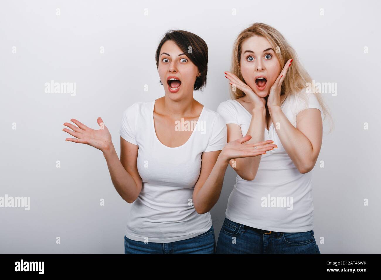 Two surprised beautiful women open hi-res stock photography and images ...