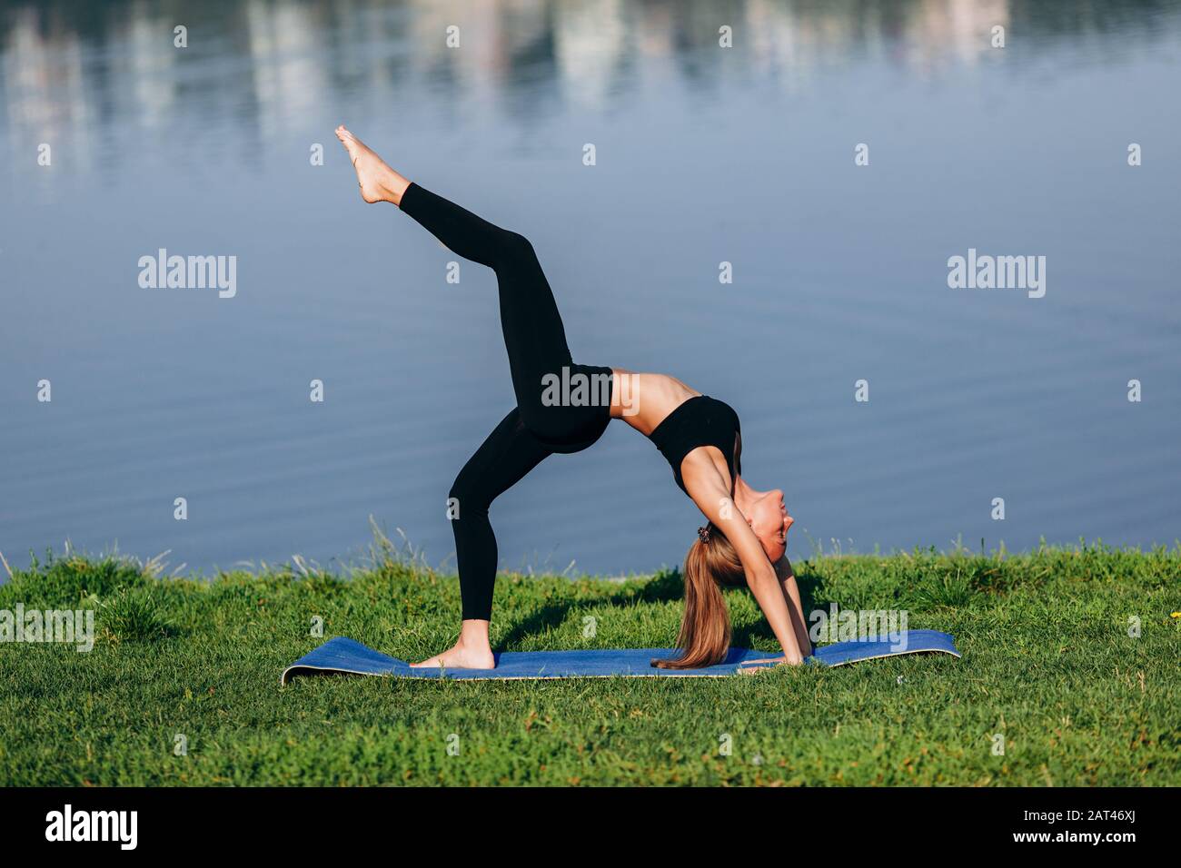 Standing back bend pose hi-res stock photography and images - Alamy