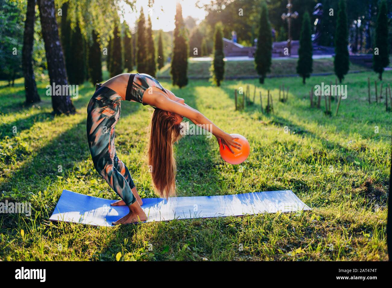 Standing deflection asana hi-res stock photography and images - Alamy