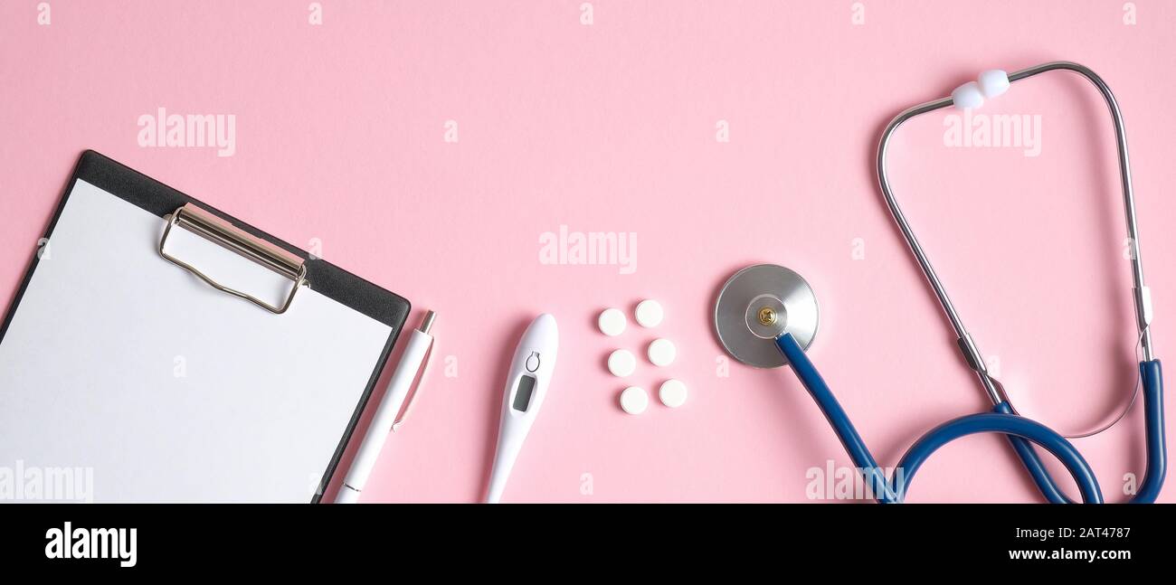 Medical equipment and tools on pink background. Top view doctors desk ...