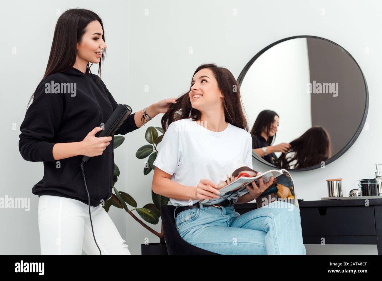 People doing something hi-res stock photography and images - Alamy