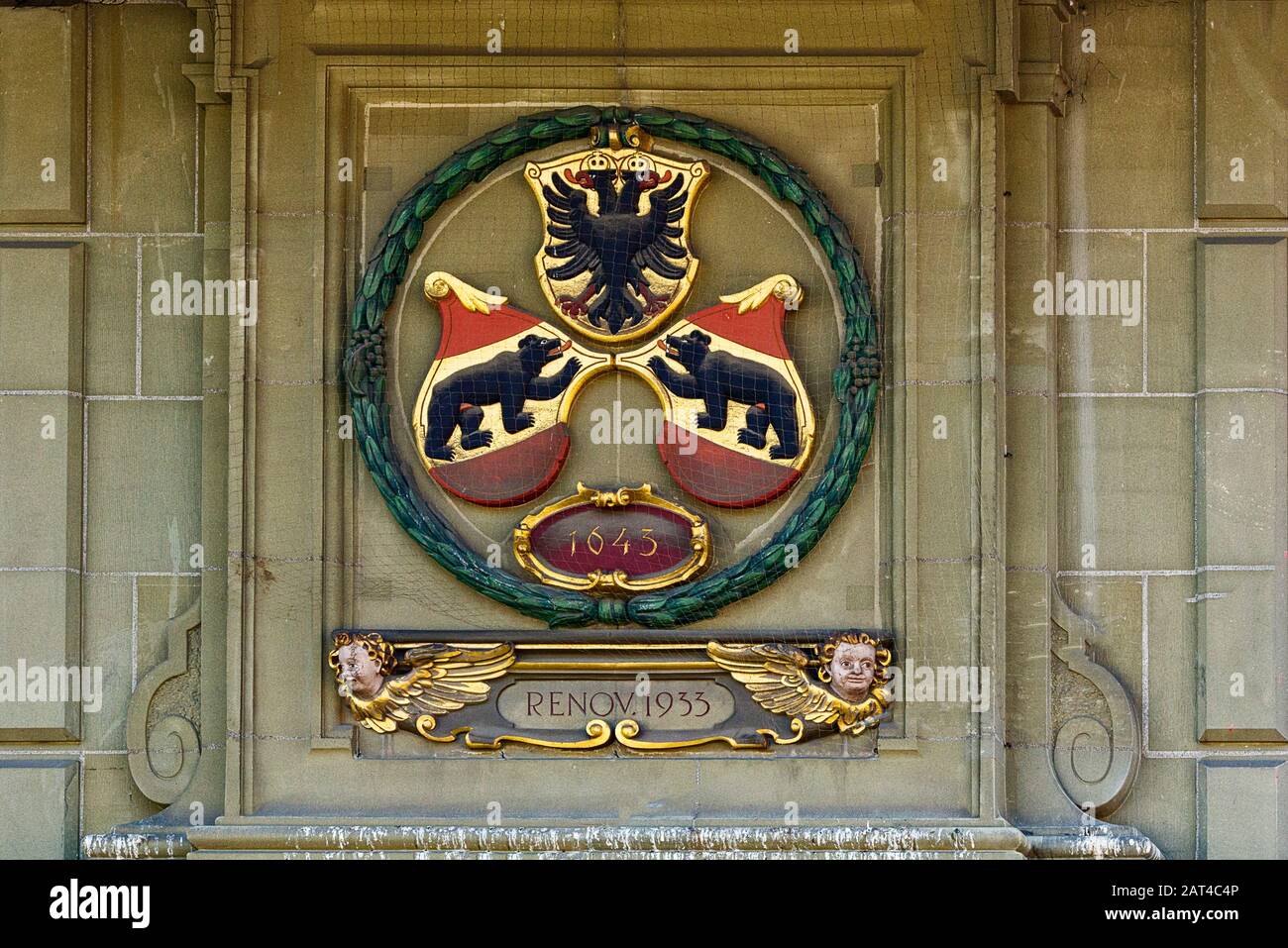 sculpture of coat of arms on a facade of the old town of Bern ...