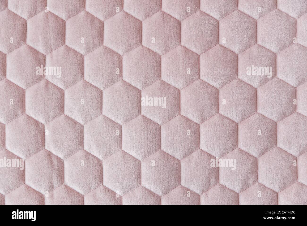 Pink color hexagon mesh fabric textured background Stock Photo - Alamy