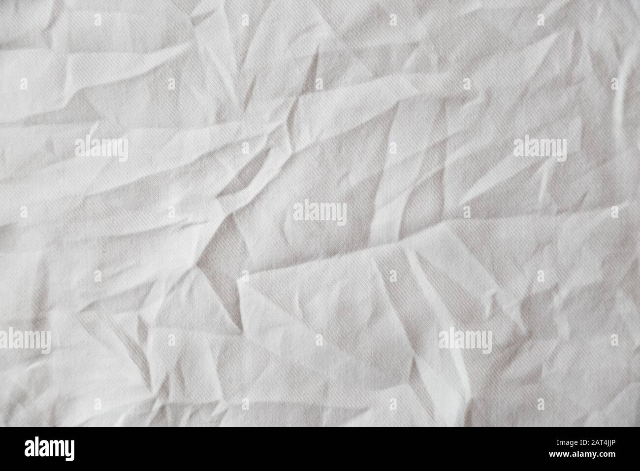 White wrinkled canvas cloth texture background Stock Photo - Alamy