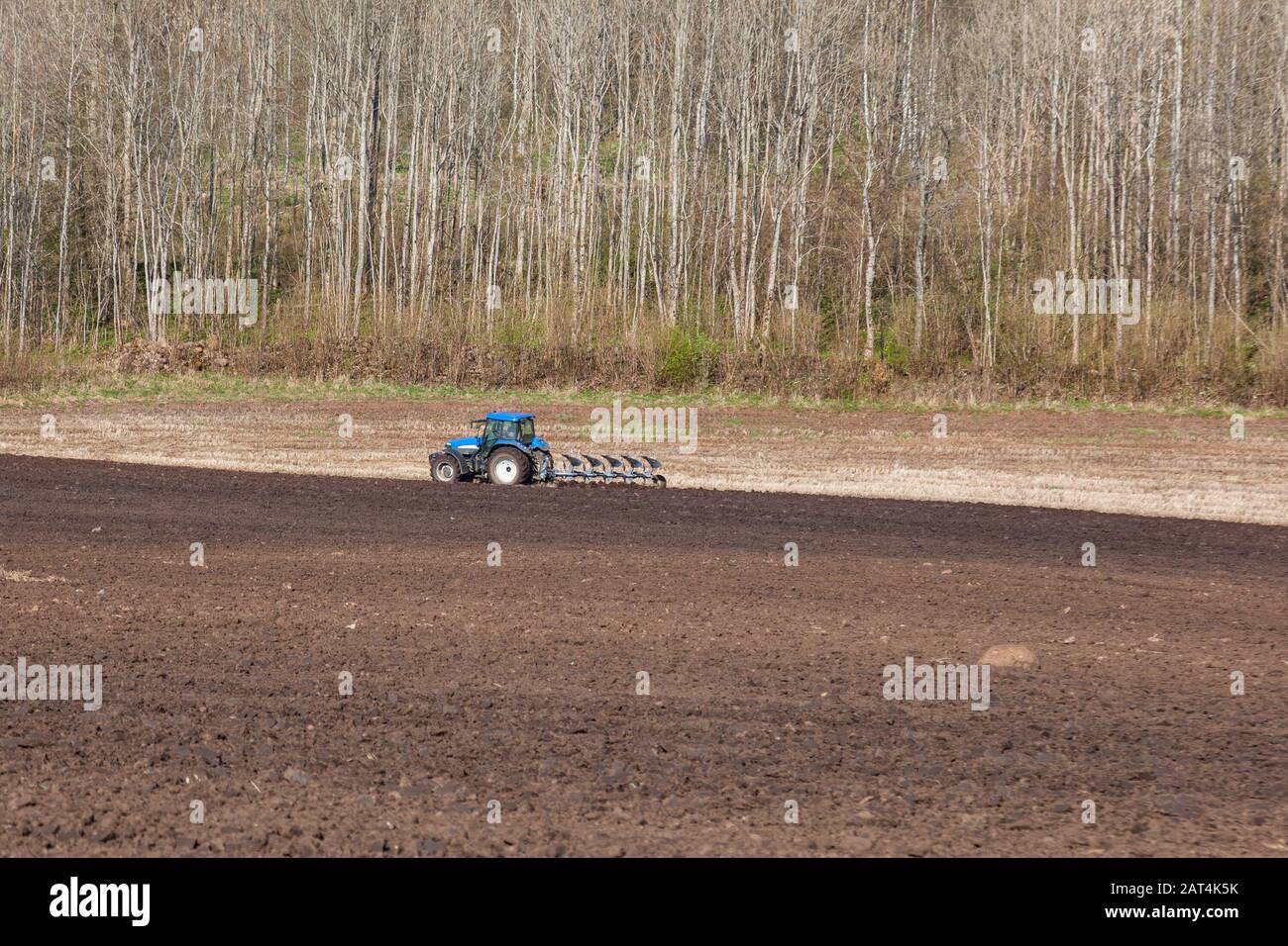 Spring plowing field tractor hi-res stock photography and images - Alamy