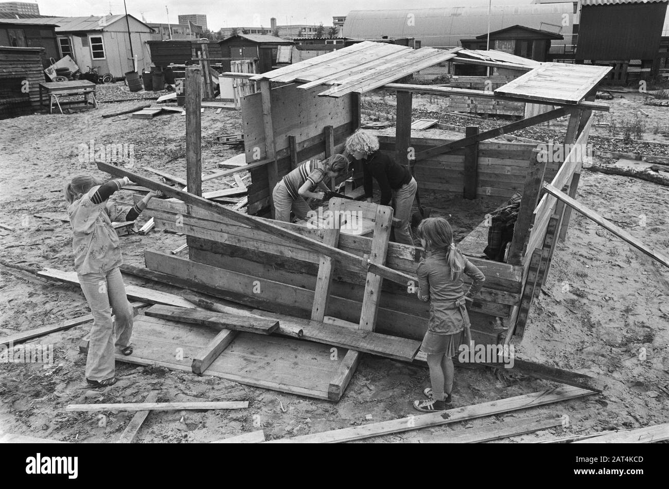 Youth plan North construction playground; children building hut Date ...