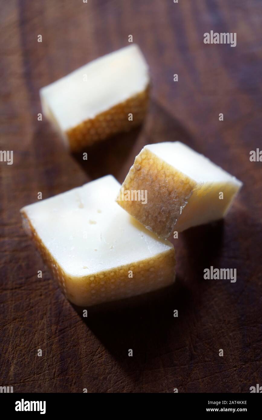 Sardinian goat cheese on a wooden board, Italy, Europe Stock Photo - Alamy