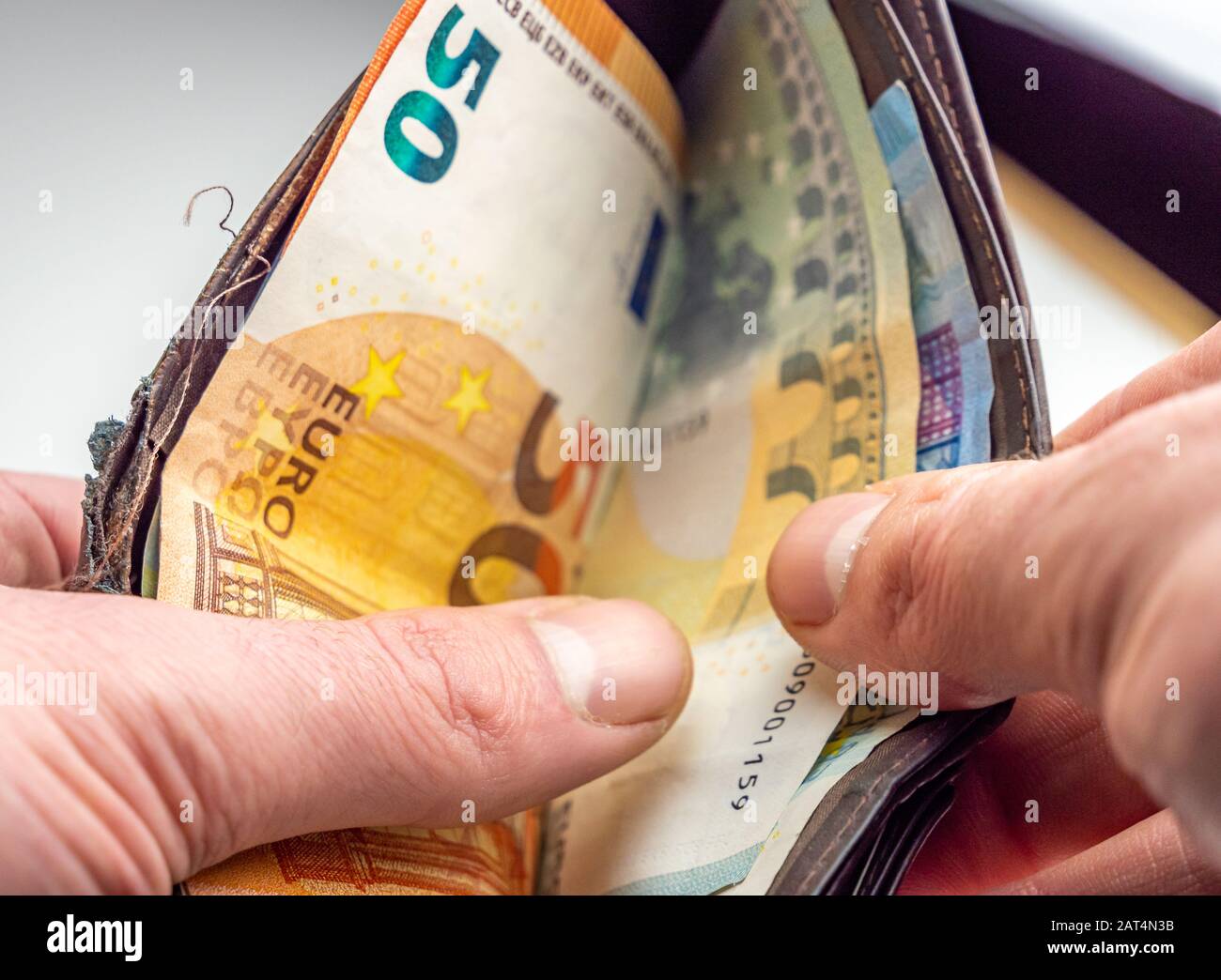 Attention counterfeit euro banknotes background Stock Photo - Alamy