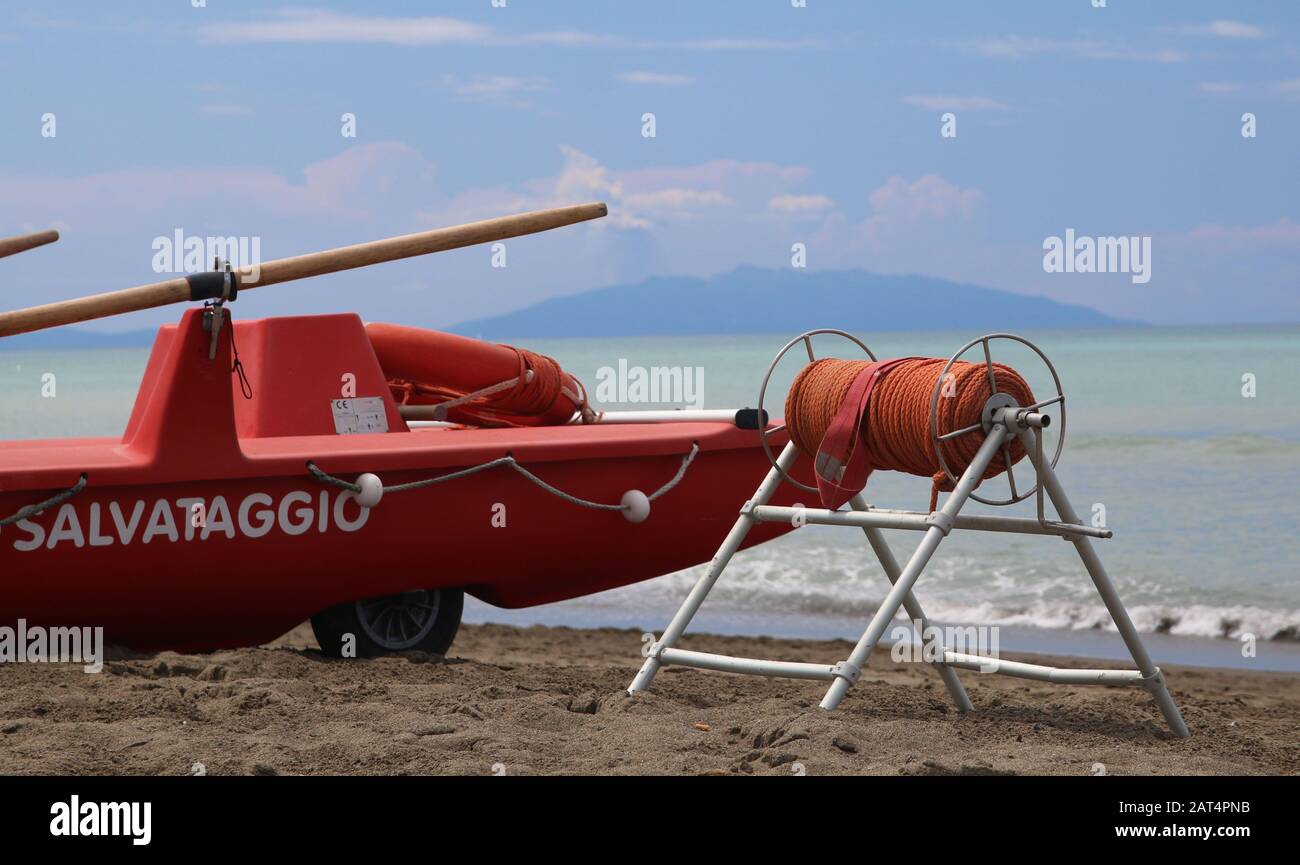 Rescue boat isolated on the beach Stock Photo - Alamy