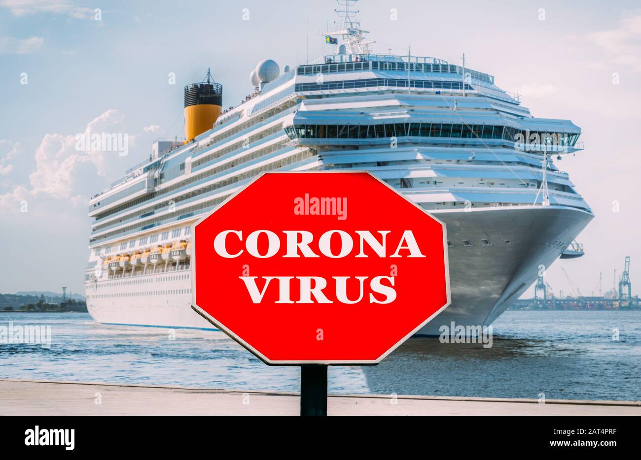 Giant cruise ship on port with stop sign indicating warning of ...