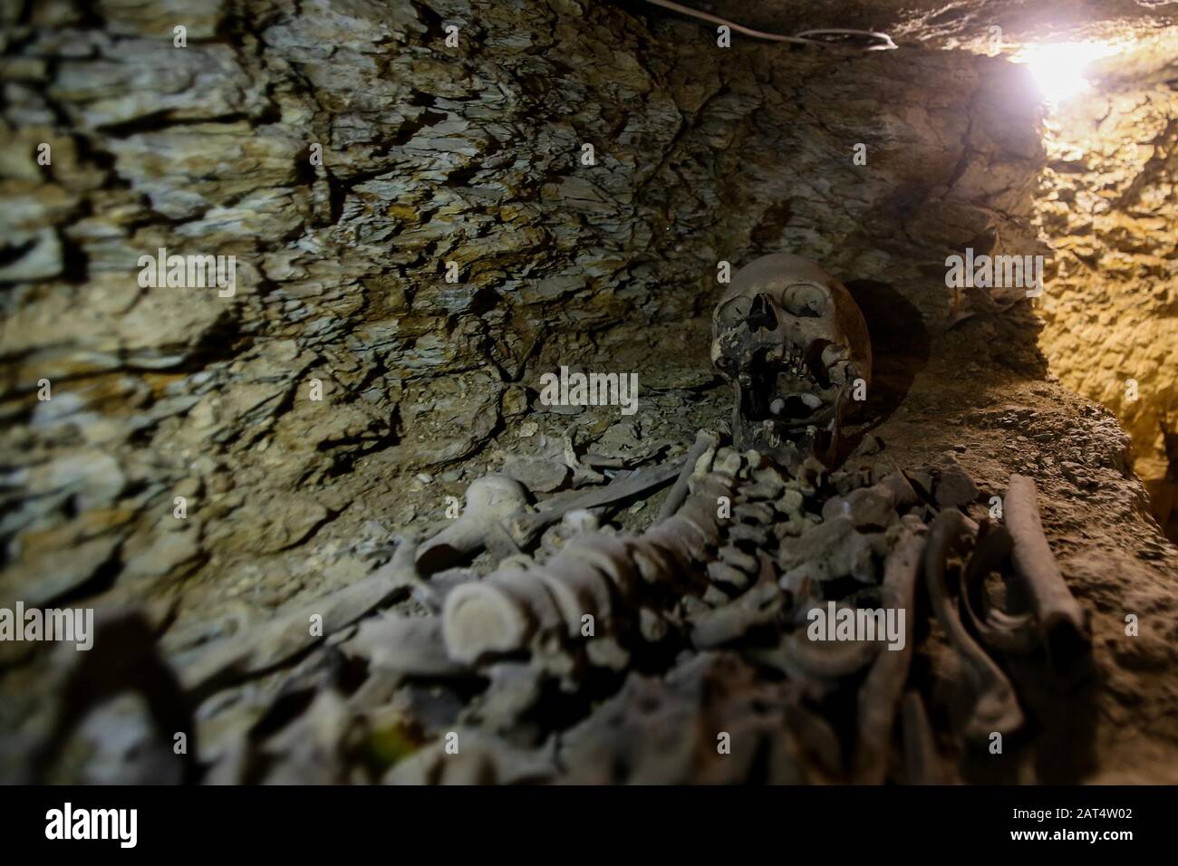 Minya, Egypt. 30th Jan, 2020. Human bones are seen inside a communal ...