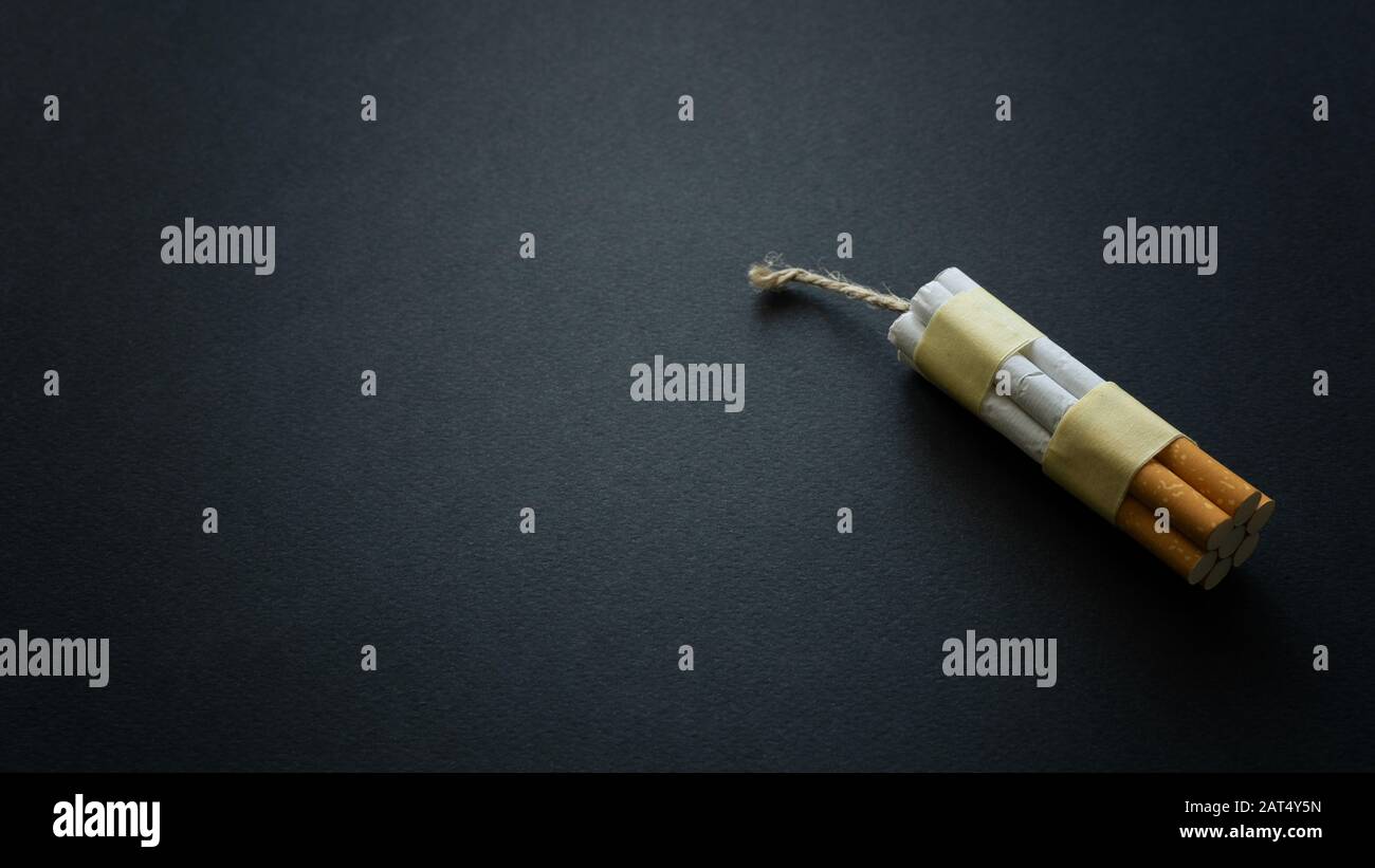 Dynamite TNT bomb made from cigarettes a quit smoking concept bad habit ...