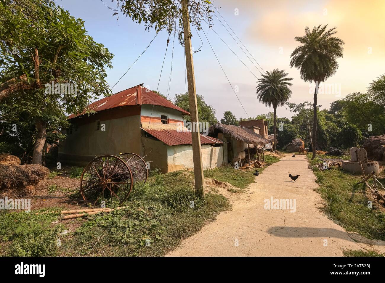 Indian tribal village at Bolpur, West Bengal India with view of mud hut ...