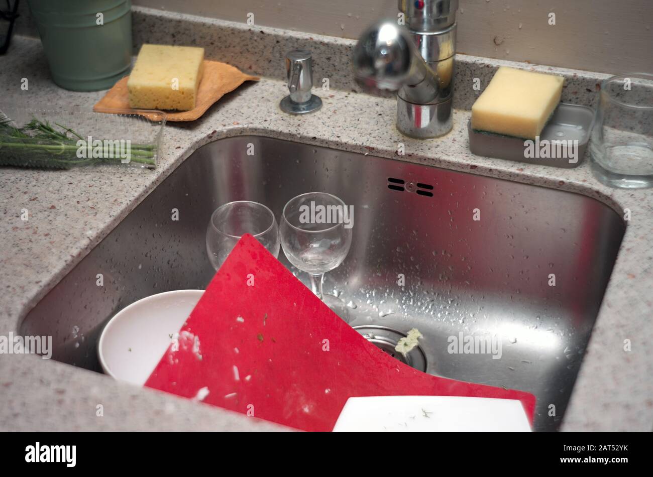 Stainless kitchen sink abandoned in mess, indoor closeup Stock Photo ...