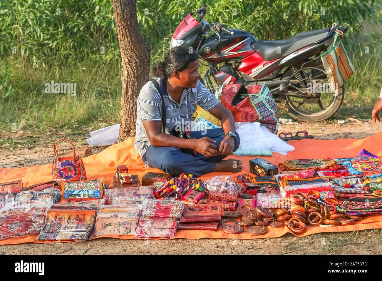 Local craftsman selling handicraft products in a street craft fair at ...