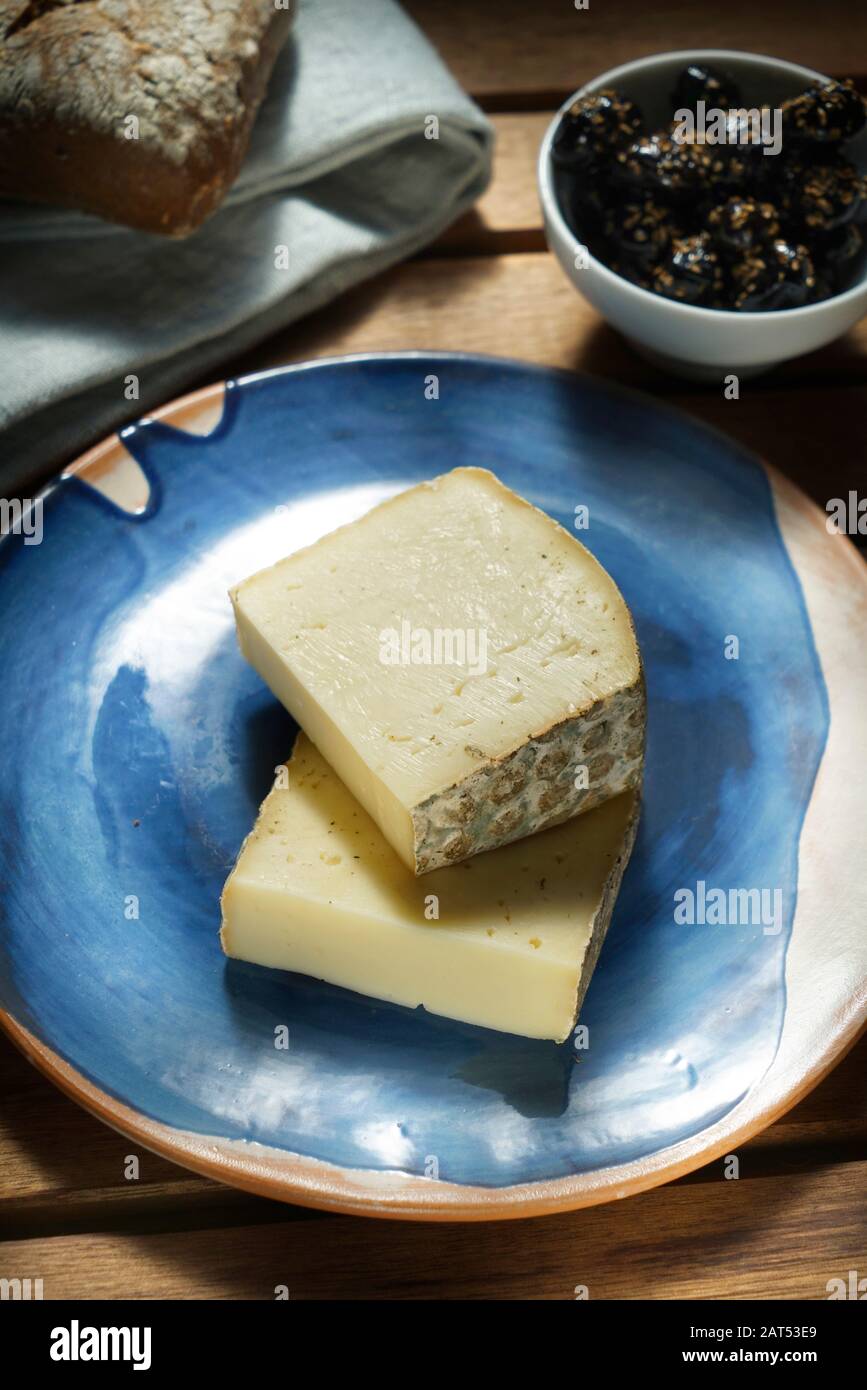 Seasoned Sicilian cheese from Castronovo, black seasoned Sicilian ...