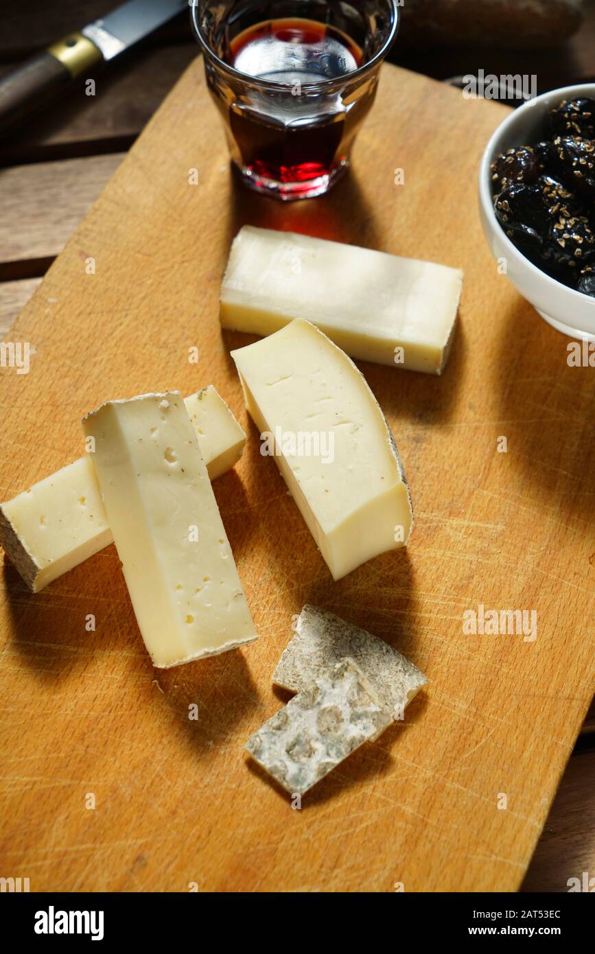 Ripened Sicilian cheese from Castronovo, black seasoned Sicilian olives ...