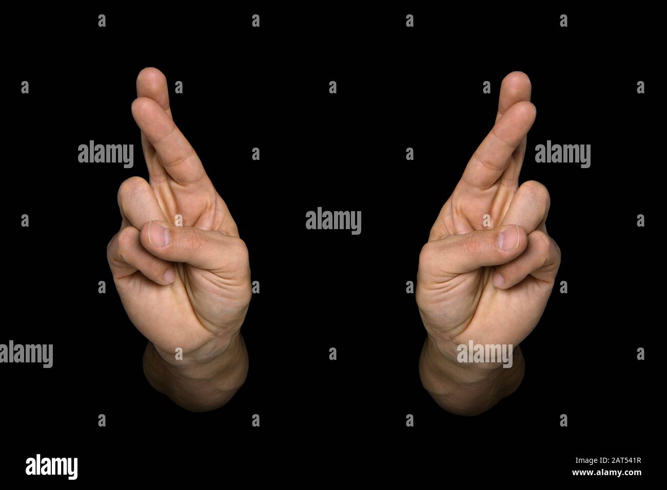 The word HOPE in British sign language on an isolated black background ...