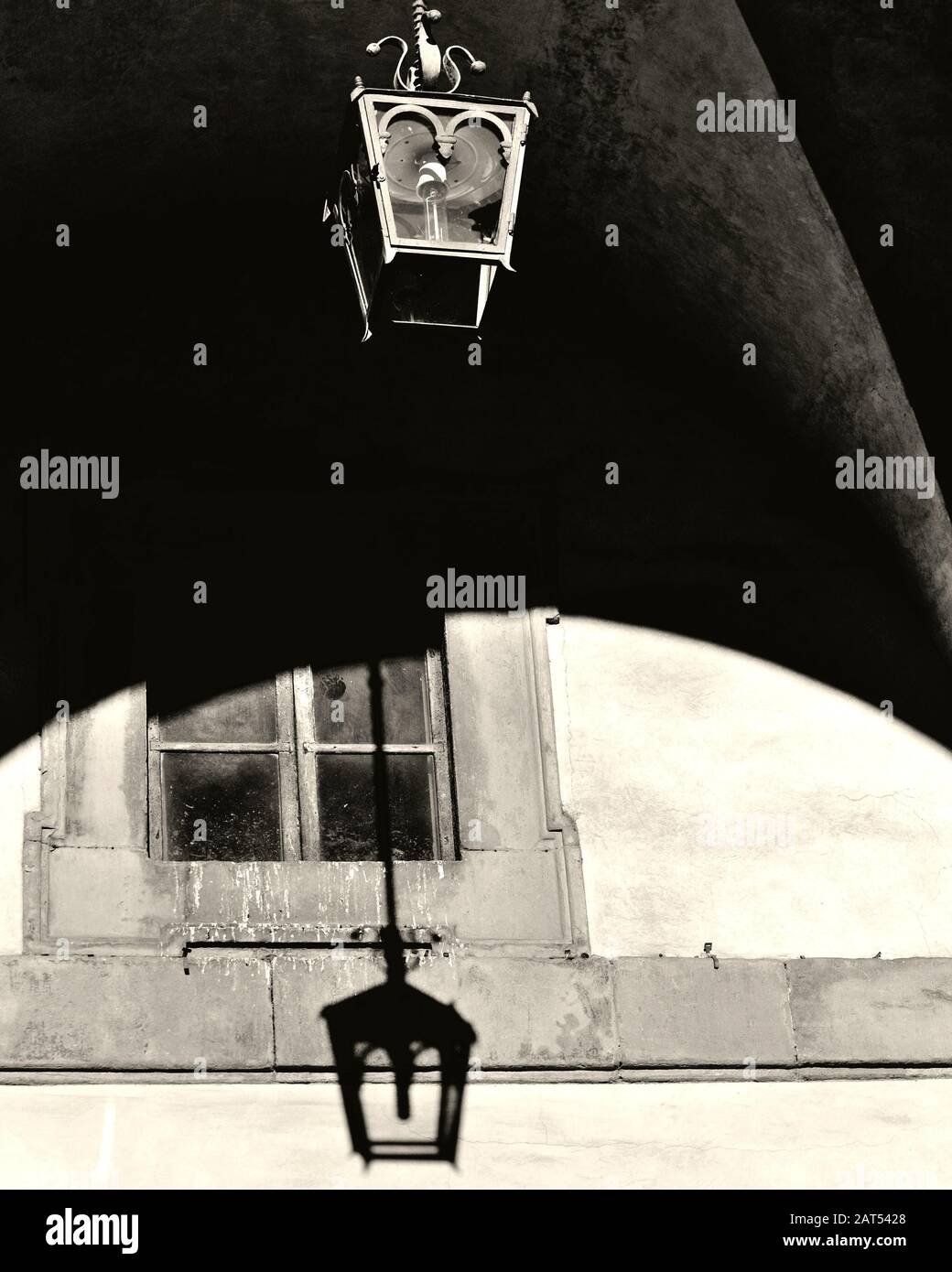 old street lamp and its shadow on the building wall Stock Photo - Alamy