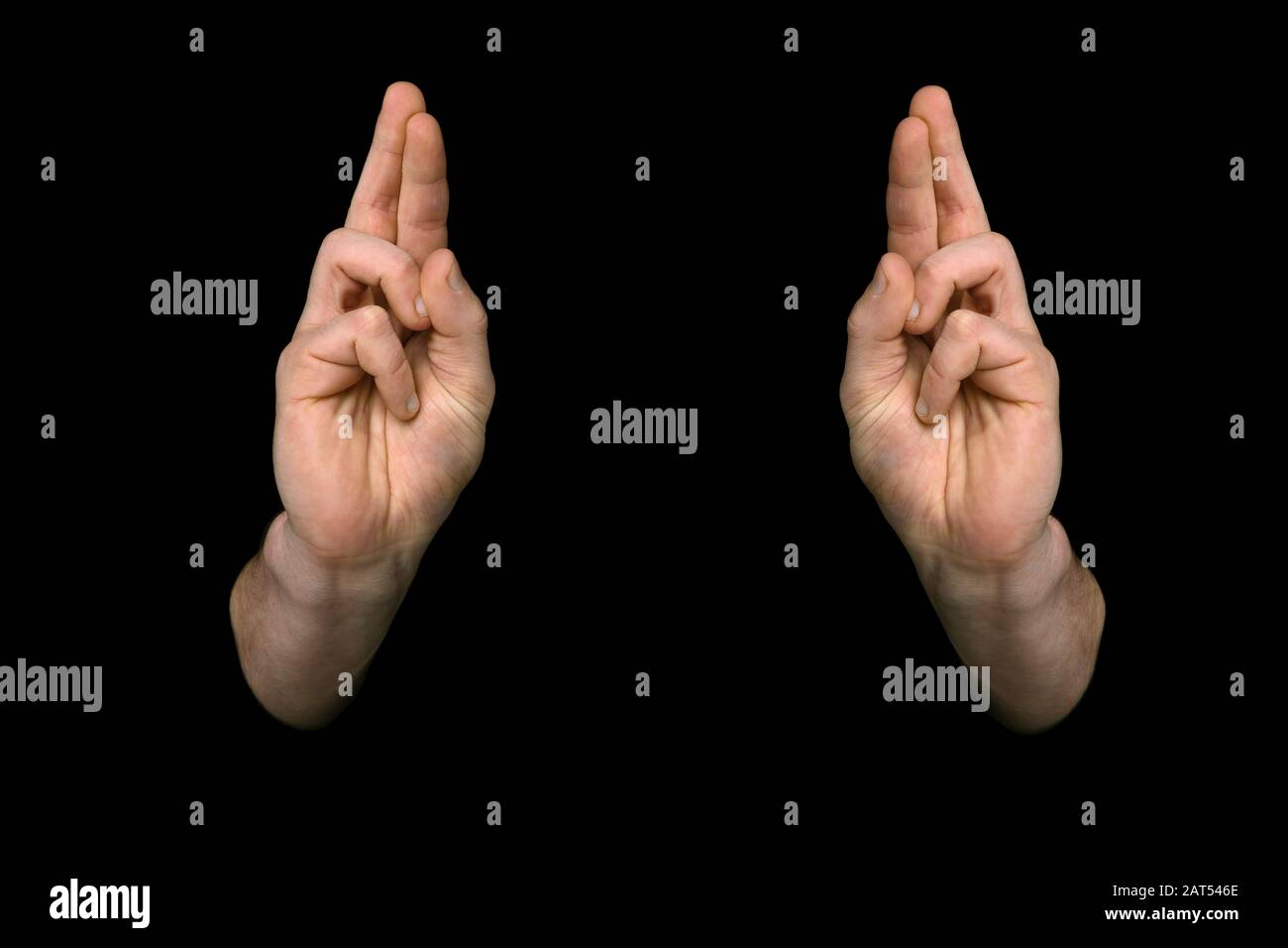 The word HOPE in British sign language on an isolated black background ...