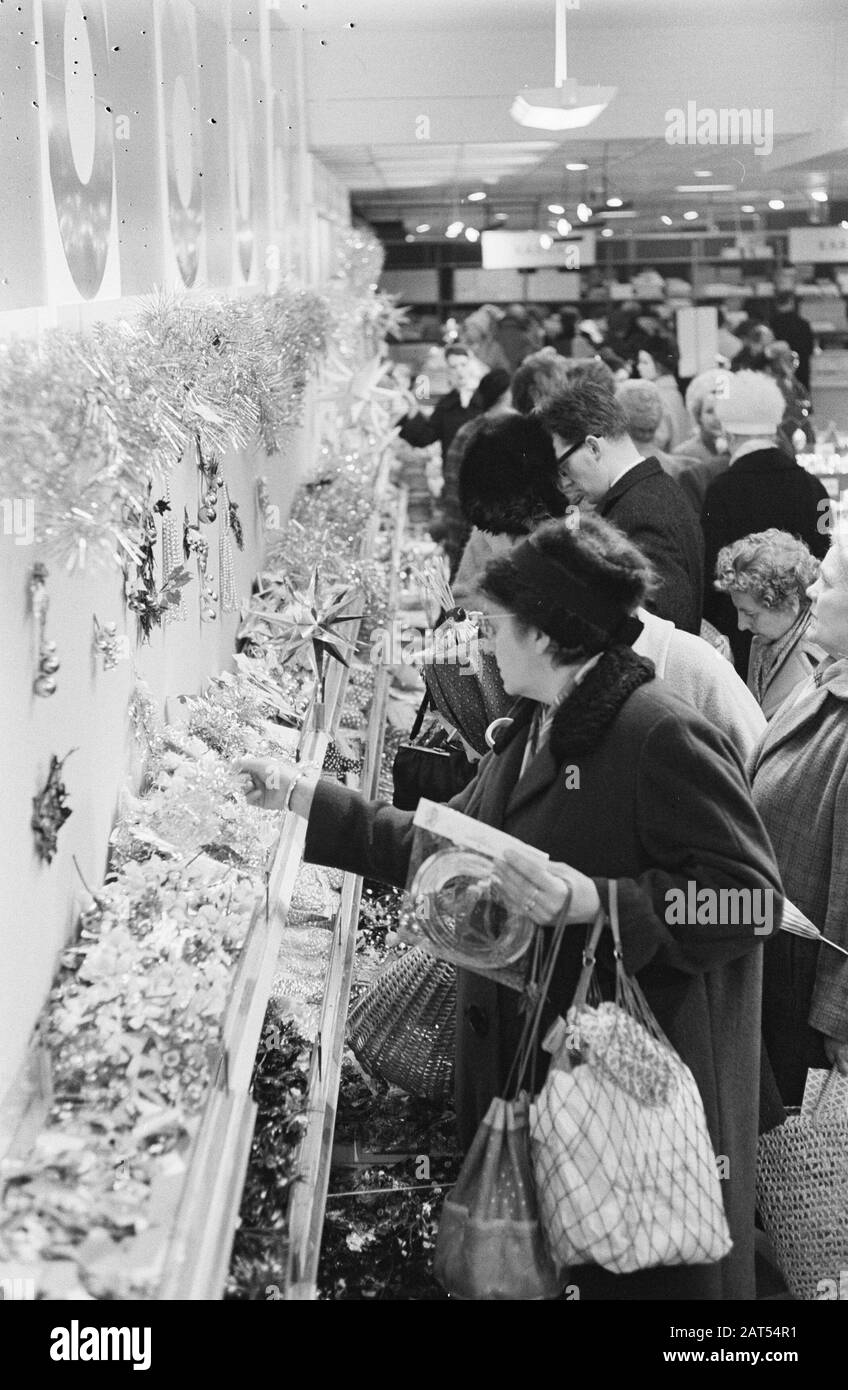 Christmas crowds in the big department stores Date: December 18, 1962 ...