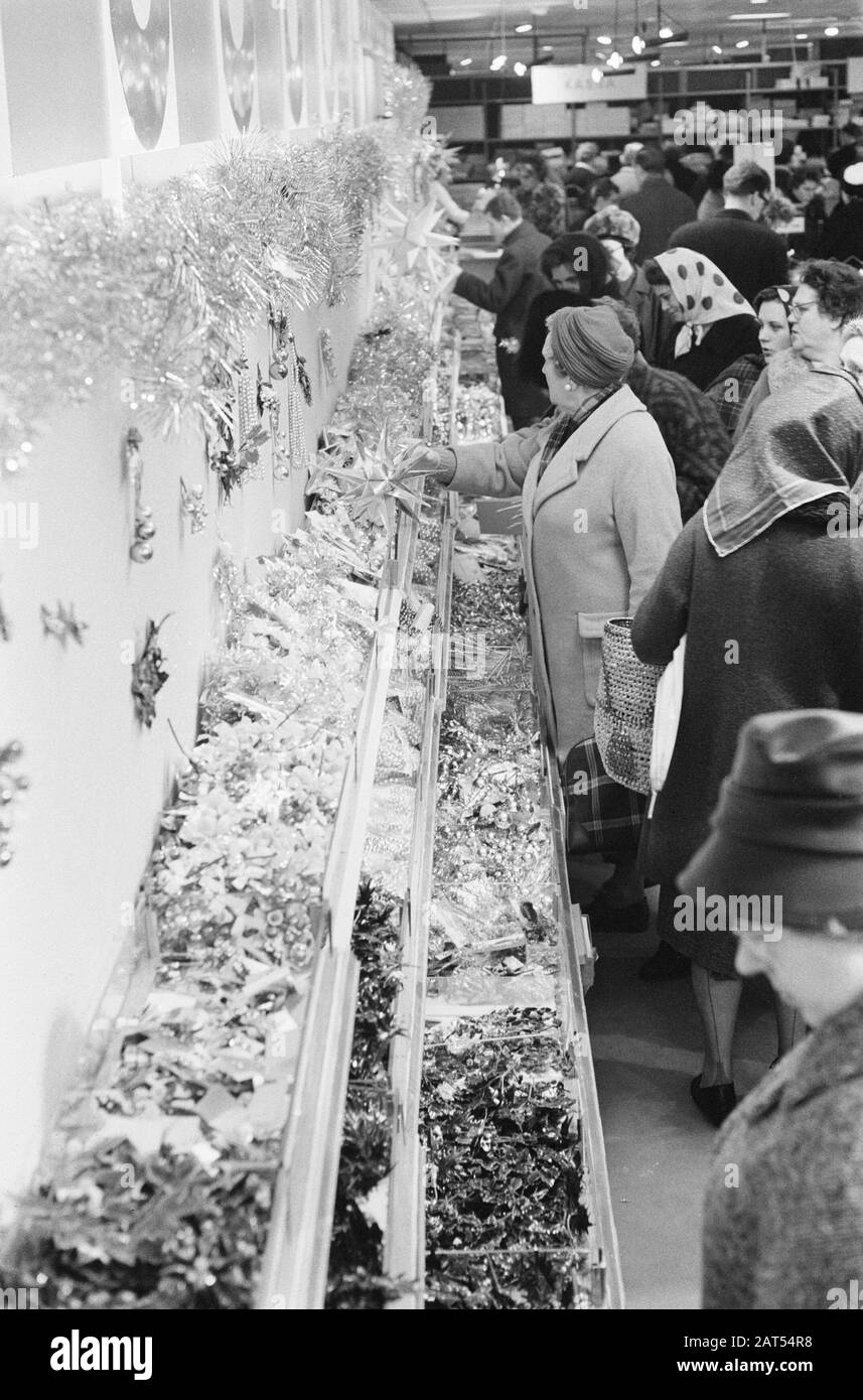Christmas crowds in the big department stores Date: December 18, 1962 ...