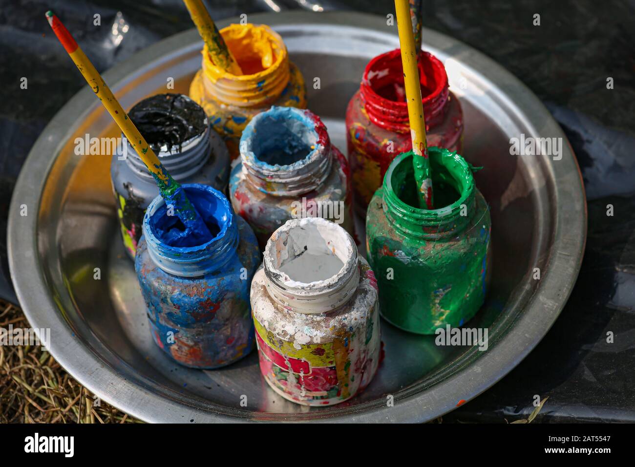 Used poster color bottles with brush for painting shot in selective ...