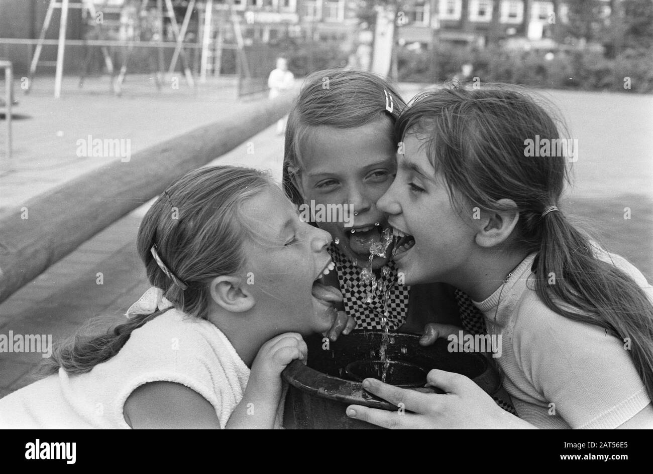 Children drinking at a fountain Date: June 30, 1969 Keywords: fountains ...