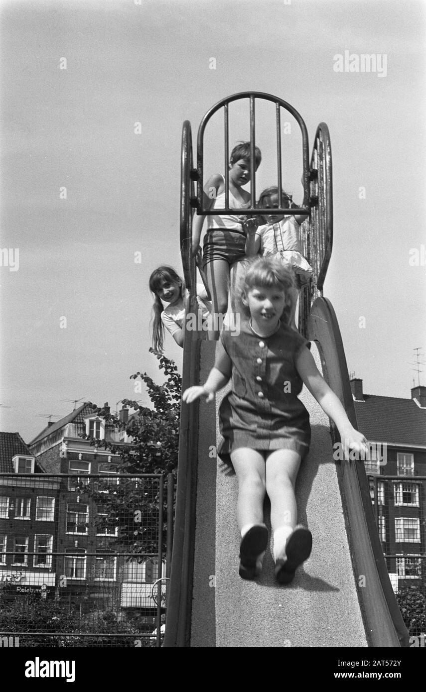 Children on the slide Date: June 30, 1969 Keywords: slides, children ...