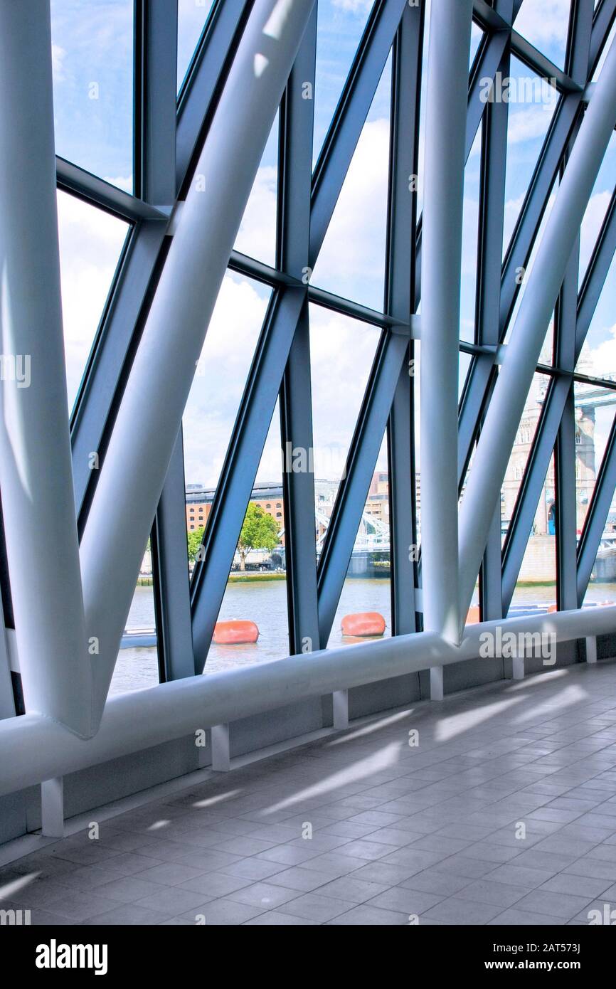 Big windows with metal construction structure pipes Stock Photo - Alamy