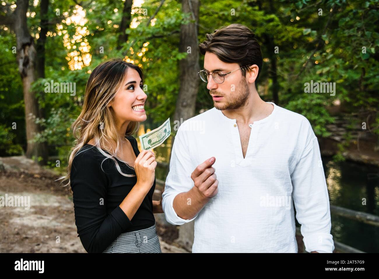 Man argues with his girlfriend for money Stock Photo - Alamy